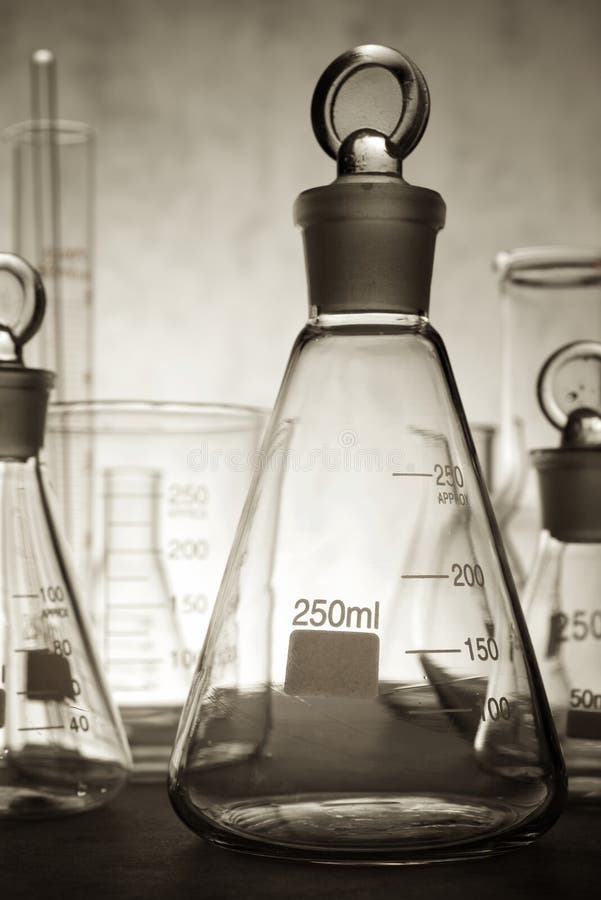 Empty Glass Flasks Placed in a Laboratory Table Stock Photo - Image of ...