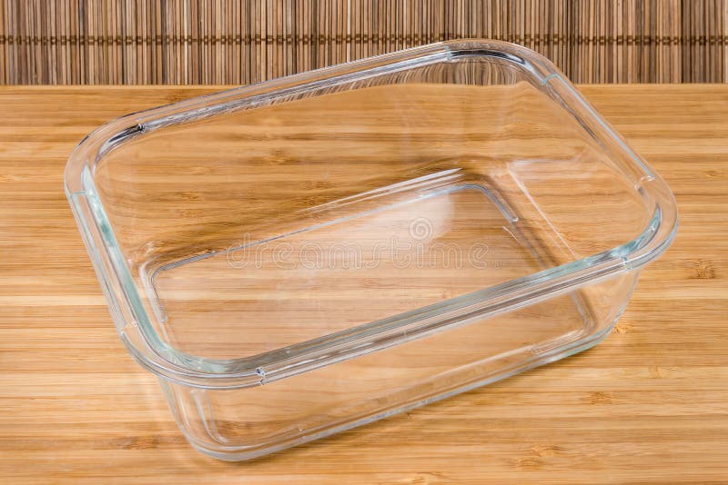 Empty Glass Food Storage Container on a Wooden Surface Stock Photo ...