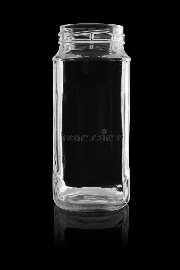 The Empty Glass Jar Isolated on a Black Background with Reflection ...