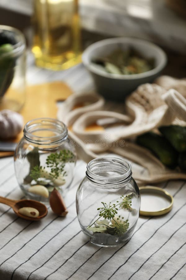 Empty Glass Jars and Ingredients Prepared for Canning on Table Stock ...