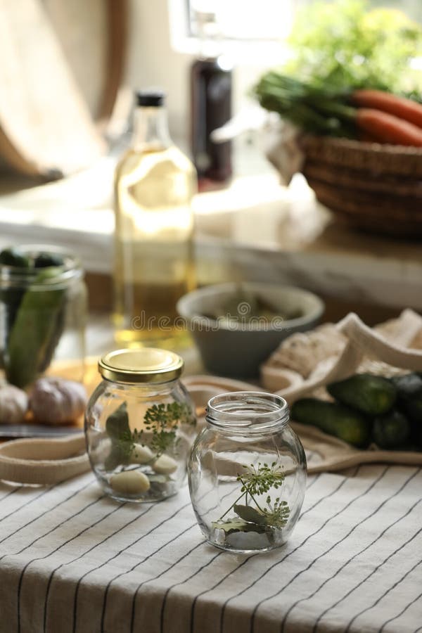 Empty Glass Jars and Ingredients Prepared for Canning on Table Stock ...