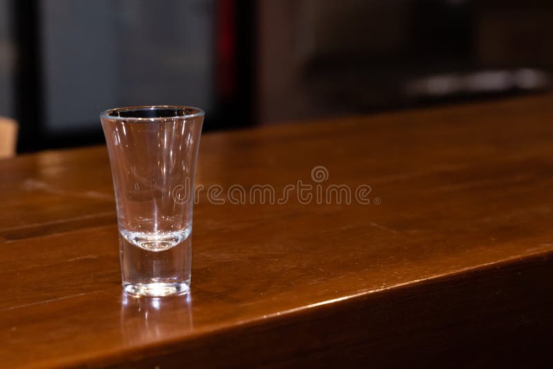 Empty Glass Shot Glass on the Bar Stock Image - Image of empty ...