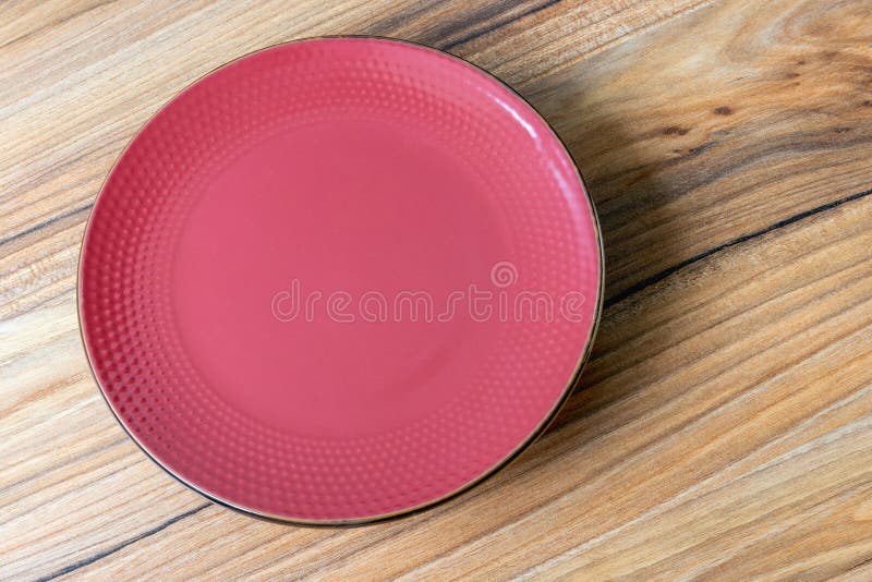 An Empty Red Plate on the Surface of a Pine Tree Stock Image - Image of ...