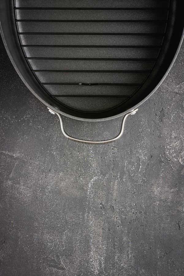 Empty Gray Nonstick Baking Dish with Handles on Dark Stone Surface Stock Image - Image of ...