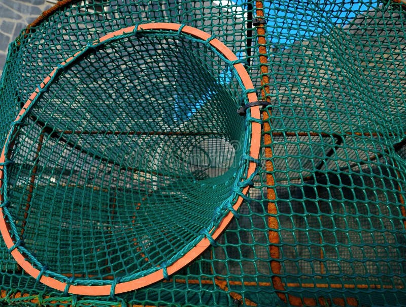 Empty Green Net Fish Traps stock photo. Image of baskets - 34922026