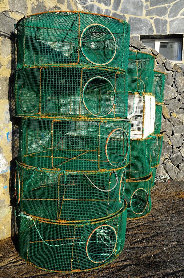 Empty Green Net Fish Traps stock photo. Image of baskets - 34922026