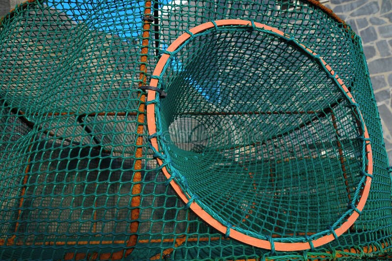 Empty Green Net Fish Traps stock photo. Image of baskets - 34922026