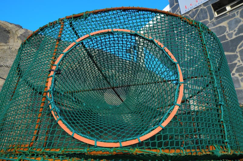 Empty Green Net Fish Traps stock photo. Image of baskets - 34922026