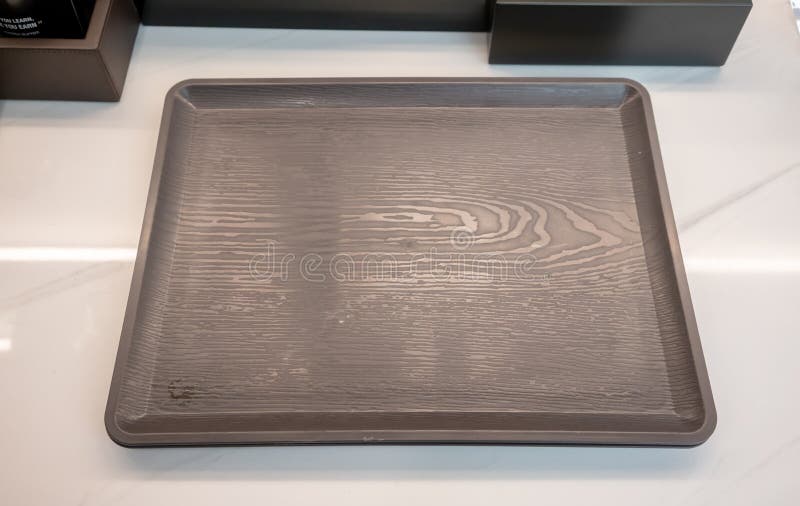 Empty Grey Plastic Tray with Wooden Pattern and Texture on White Table ...