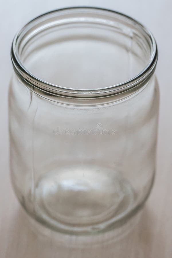 Empty Half-liter Glass Jar on the Table Closeup Stock Image - Image of ...