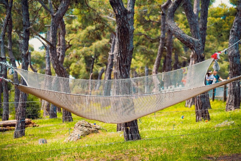 Empty Hammock Hanging on Trees for Relaxing in the Public Park ...