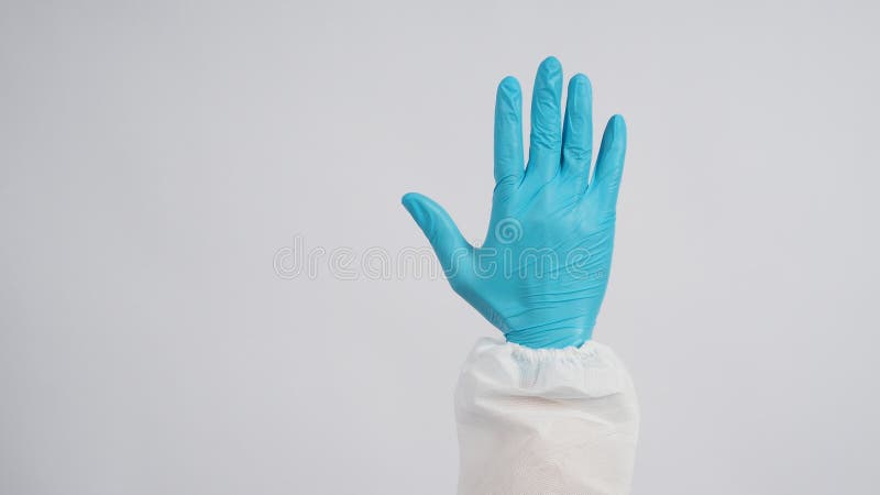Hand with PPE Suite and Hand is Holding Blood Test Tubes and Wearing ...