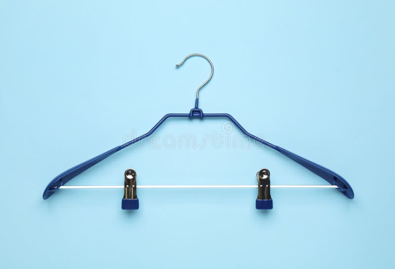 Empty Hanger on Light Blue Background, Top View Stock Image - Image of ...