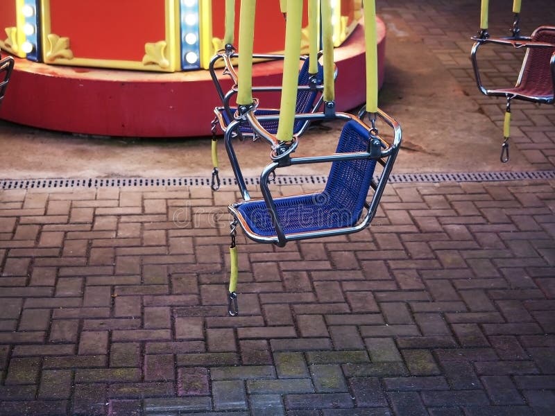 Empty Hanging Swing Nest on the Background of a Snow-covered Rural ...