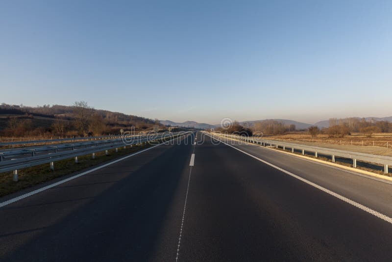 Empty highway at sunset stock image. Image of road, nature - 82644427