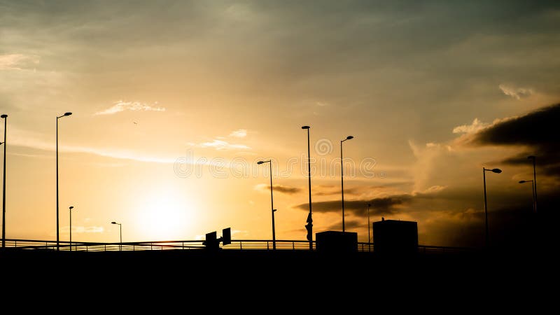 Empty Highway at Sunset in Cloudy Weather Stock Photo - Image of ...