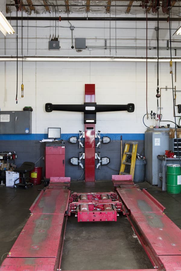 Empty Hoist in Automobile Repair Shop Stock Image - Image of clothing ...