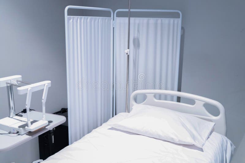 Empty Hospital Bed with Emergency Equipment. Stock Photo - Image of ...