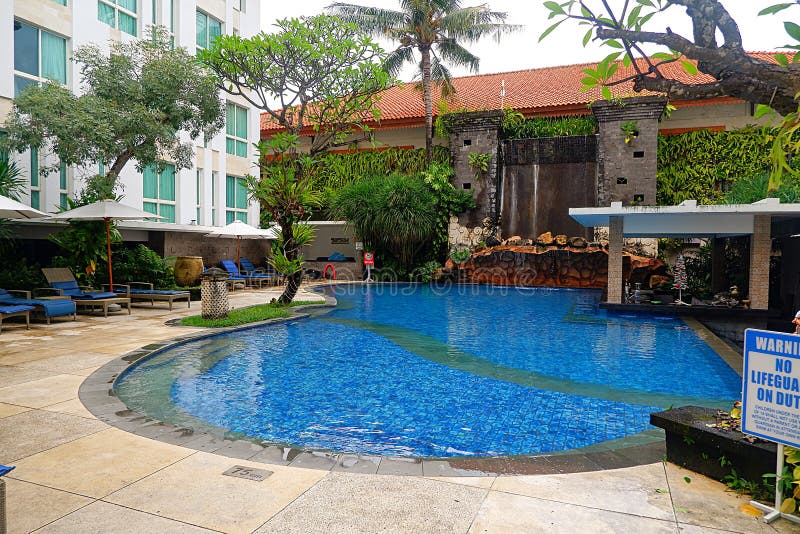 Hotel Swimming Pool in Bali, Indonesia Stock Image - Image of backyard ...