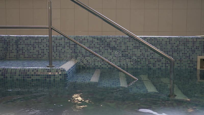 Empty Indoor Swimming Pool with Flares on Water Stock Video - Video of ...