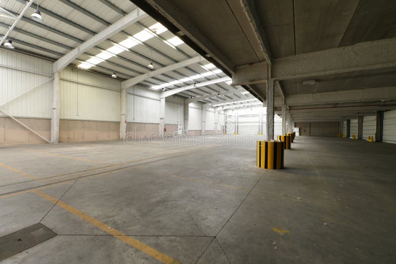 Empty Industrial Warehouse with Corrugated Iron Roofs with Skylights ...