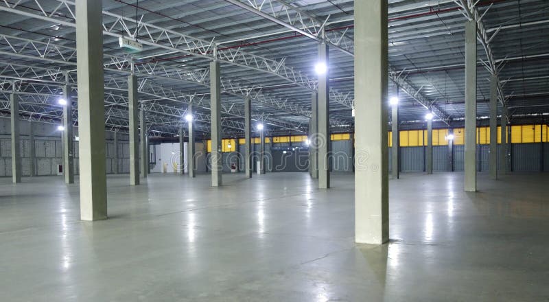An Empty Industrial Warehouse with Large, Clean Windows, Atmospheric ...