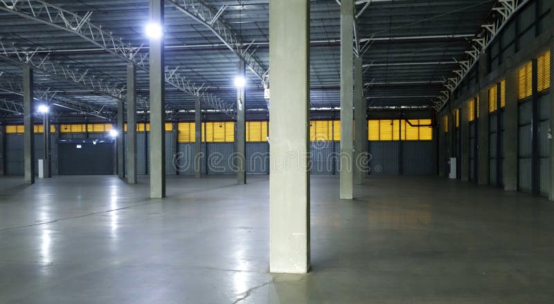 An Empty Industrial Warehouse with Large, Clean Windows, Atmospheric ...
