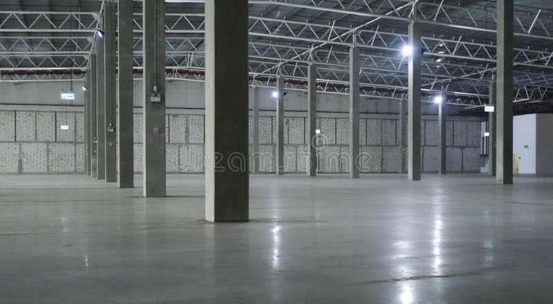 An Empty Industrial Warehouse with Large, Clean Windows, Atmospheric ...