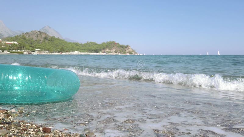 Inflatable Ring on the Shore Stock Footage - Video of abstract ...