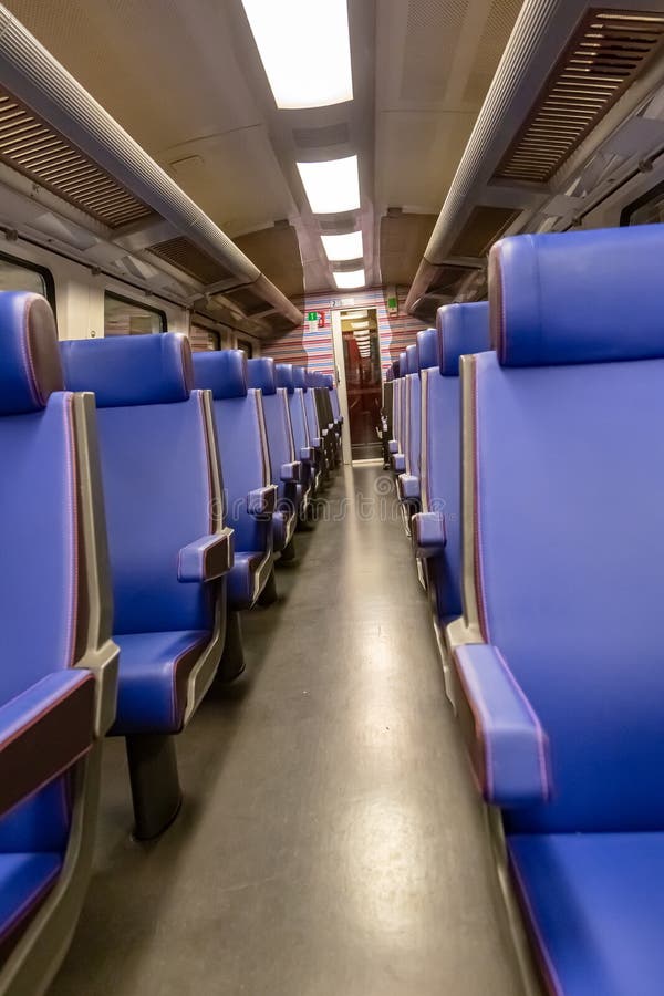 Empty Interior of a Passenger Train Car in Motion Stock Image - Image ...