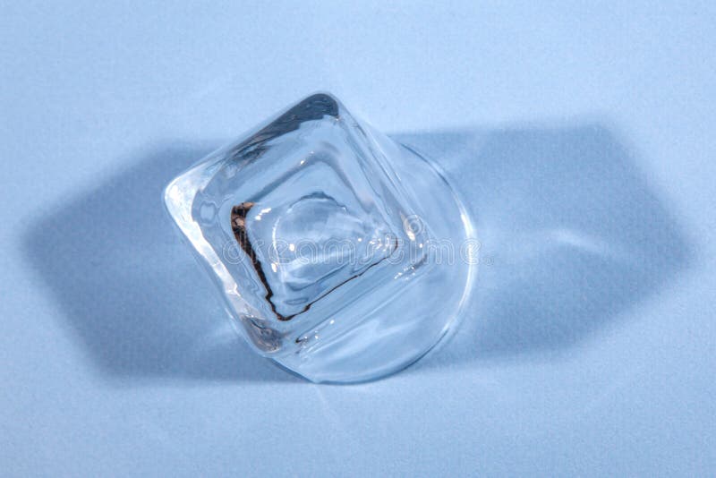 Empty Inverted Glass on Blue Background. Studio Photo Stock Photo ...