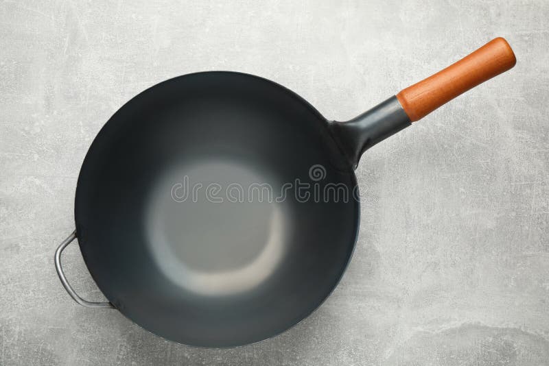 Empty Iron Wok on Grey Table, Top View. Chinese Cookware Stock Photo ...