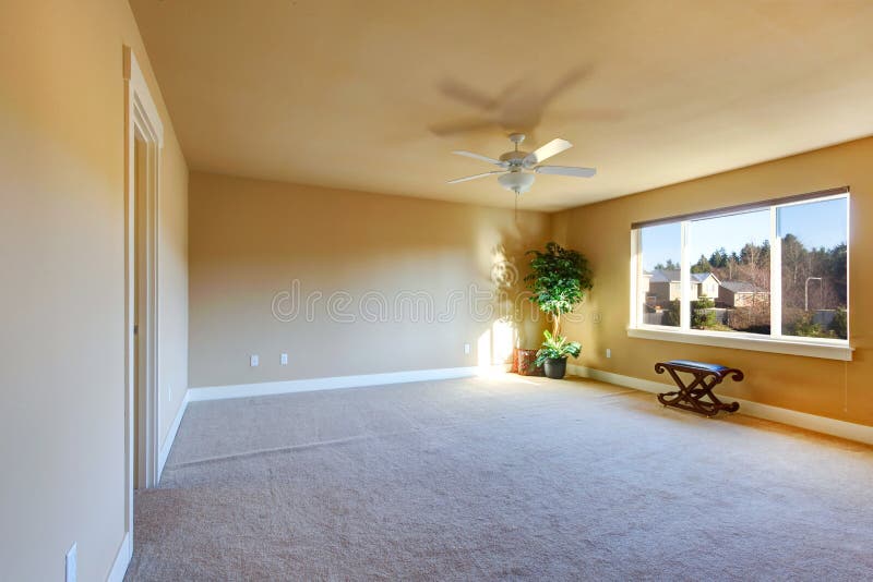 Empty Ivory Room with Blade Ceiling Fan Stock Image - Image of room ...