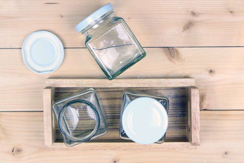 Empty jar on wood table stock image. Image of path, container - 64148153