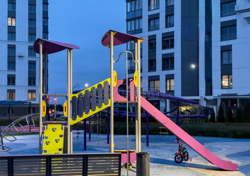 Empty Kids Playground with Modern Bright Slide at Night, Evening Stock ...