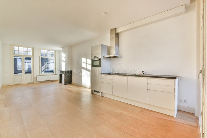 Empty kitchen design stock image. Image of floor, stove - 237167443