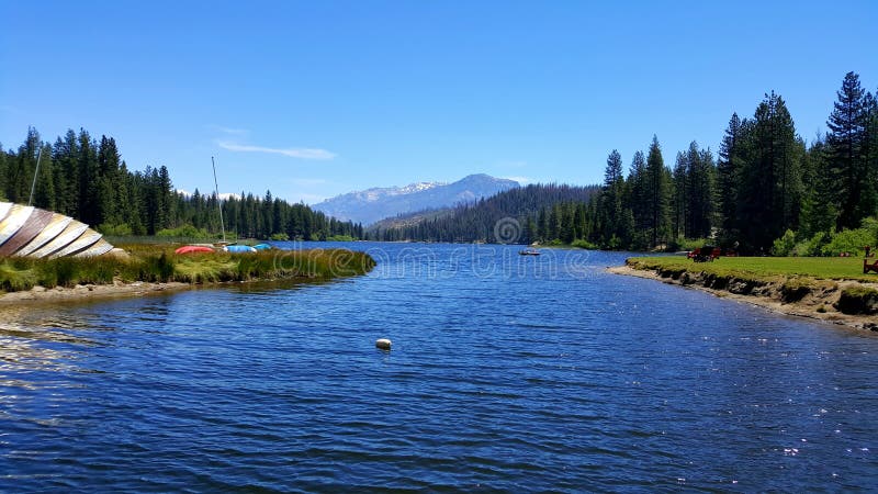 Empty Lake with Clear Blue Sky in Mountains. Stock Photo - Image of ...