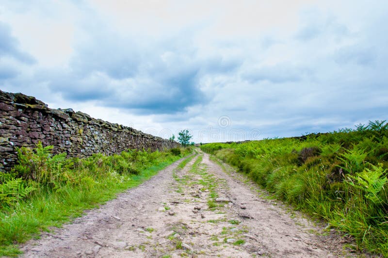 Empty Lane with Stone Fences Stock Image - Image of hills, fences: 44682681