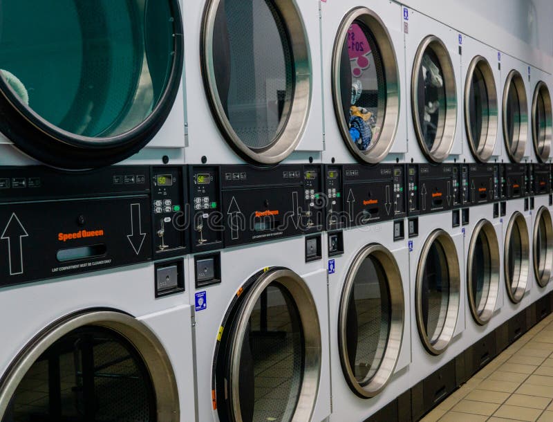 Empty laundromat at night editorial stock photo. Image of washers ...