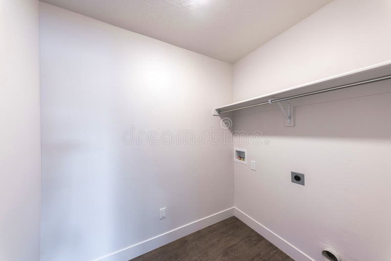Empty Laundry Room of a House with White Wall Interior Stock Image ...