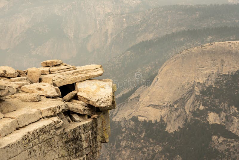 Empty Ledge Looks Over Yosemite Valley from Half Dome on Smoky Day ...