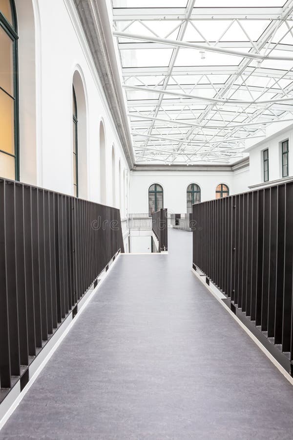 An empty library corridor stock image. Image of shelves - 132704703