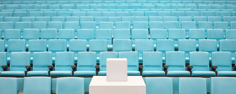 Empty Light Blue Auditorium Seats with White Cube Display Stand Stock ...