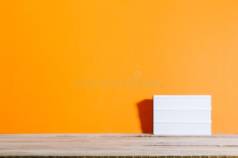 Light Box on Minimal Blue Background with Plane and Other Items Stock ...