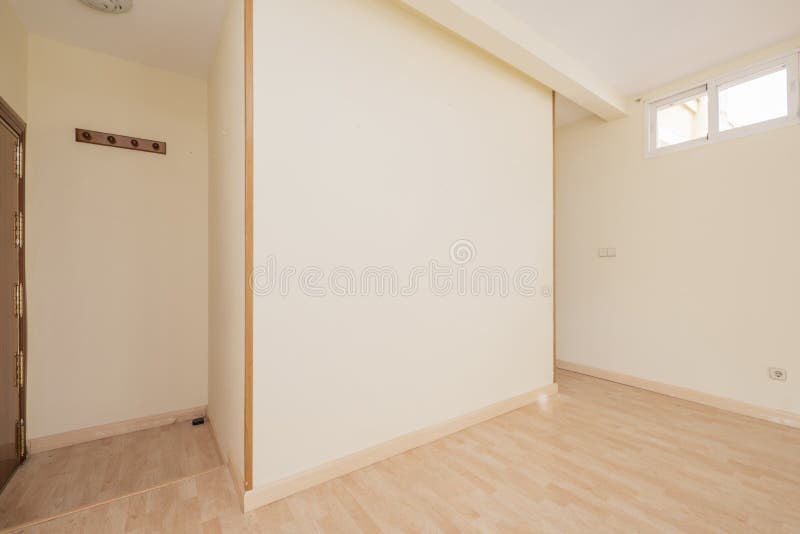 Empty Living Room with Oak Front Door, Light Driftwood Flooring and ...
