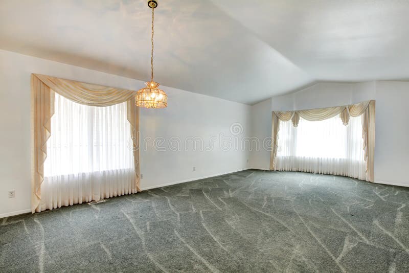 Empty Room With Vaulted Ceiling
