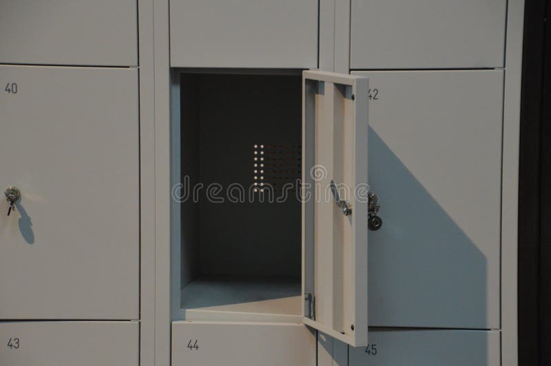 Empty Locker Room with Blue and Yellow Lockers in a Row Generated by AI ...