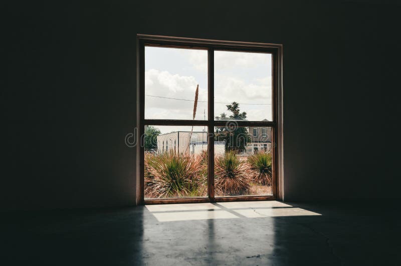 Empty Loft Interior of a Building with a View of the City of Marfa ...