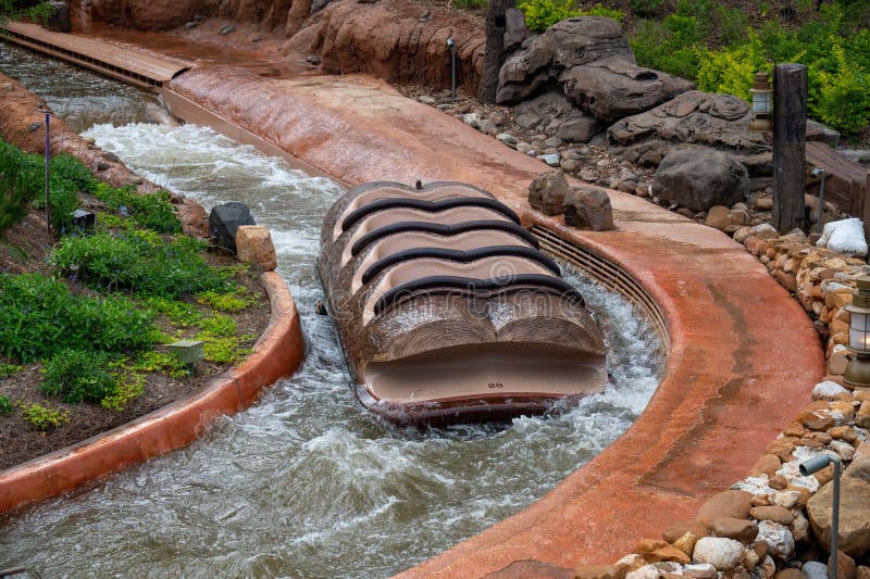 Empty Log Boat on a Log Flume Ride Stock Photo - Image of fast, water ...