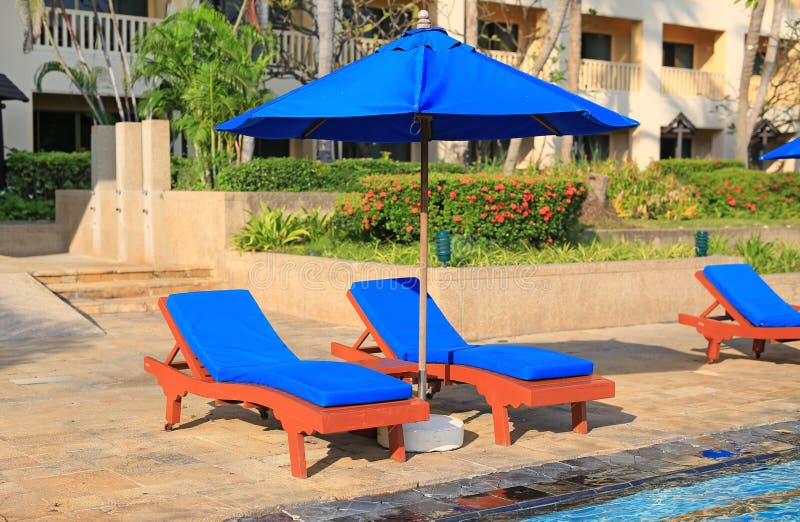 Empty Lounge Chairs Near the Pool in the Sunny Day Stock Photo - Image ...